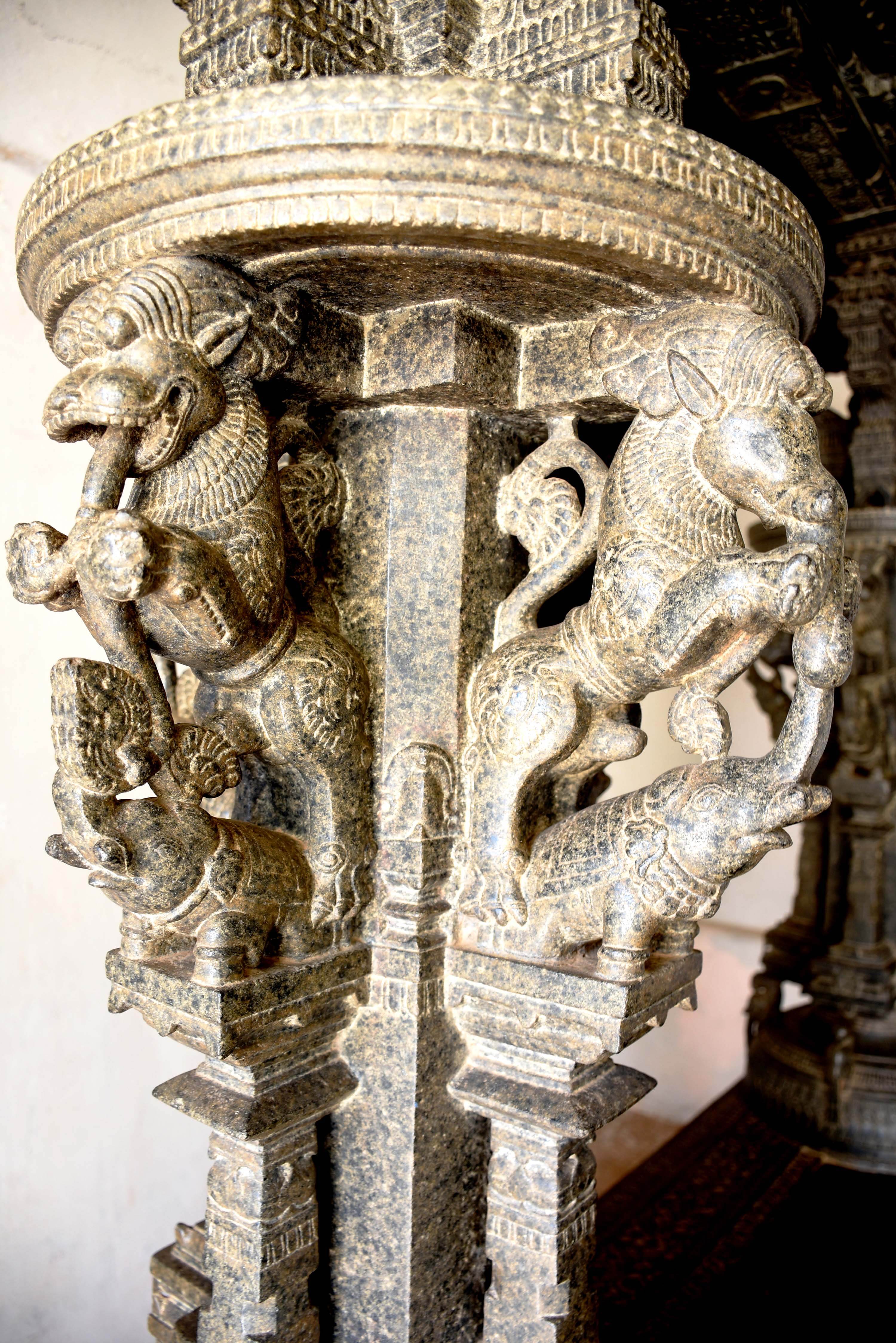 Carved bed stead of stone existing in a small chamber in the south side ...